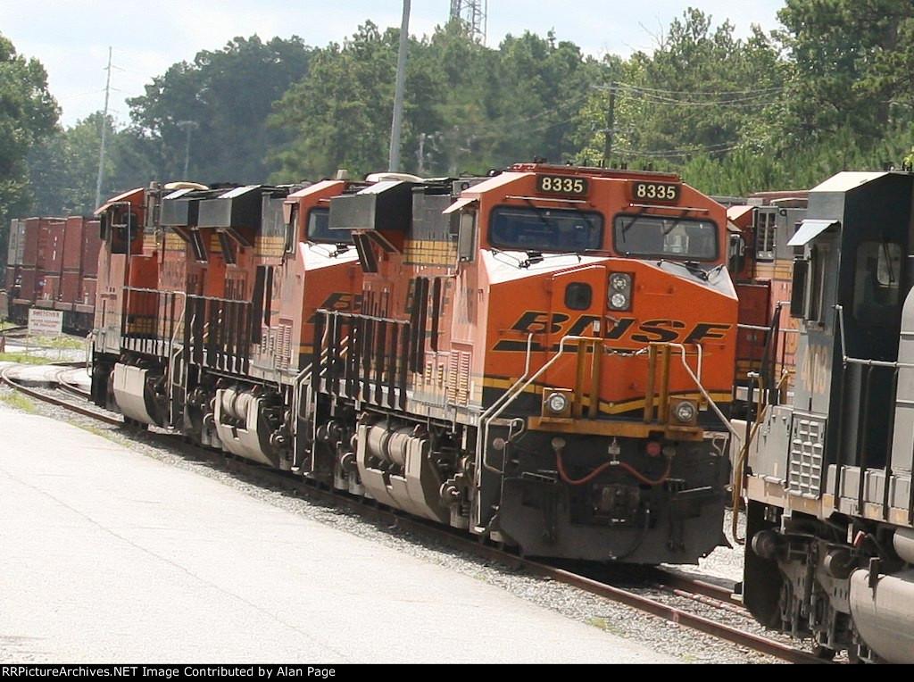 BNSF 8335 leads a trio of BNSF units laying over